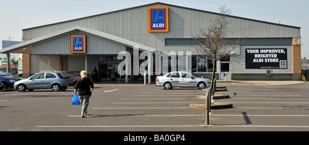 Aldi sign at the entrance to the car park of a large Aldi supermarket ...