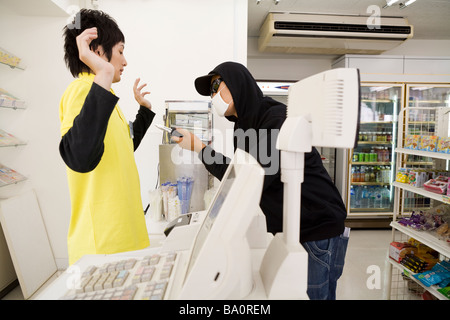 Convenience store clerk Stock Photo - Alamy