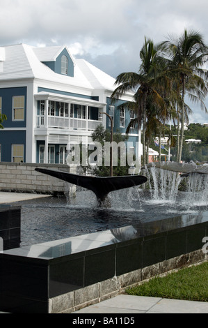 Shot of three life-sized bronze sculptures of Humpback whale tails in a ...