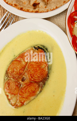 Fish Caldine is a goan yellow non spicy curry which is made of snapper ...