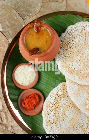 Set dosa is a set of 3dosas topped with butter or ghee and served with ...