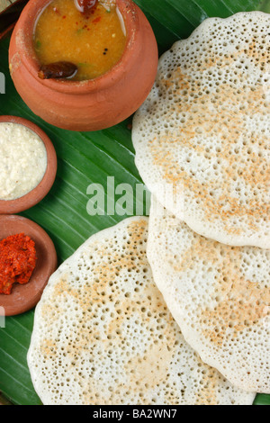 Set dosa is a set of 3dosas topped with butter or ghee and served with ...