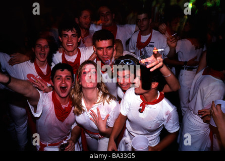 Young Spanish people enjoying themselves at The Running of the Bulls ...
