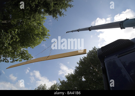 Truck detail crane wood-bearers building site construction works house ...