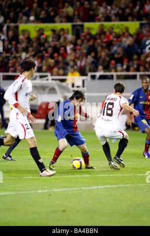 Messi surrounded by oponent players Stock Photo - Alamy
