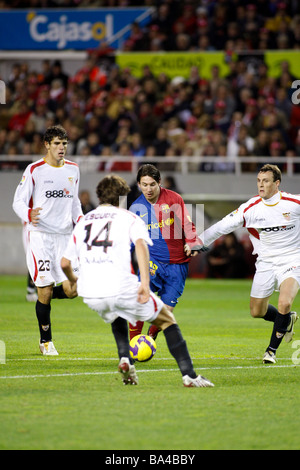 Messi surrounded by oponent players Stock Photo - Alamy