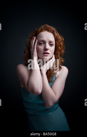 Red haired girl crying Stock Photo - Alamy
