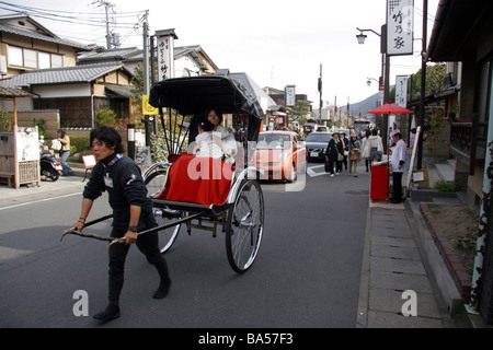 Handpulled rickshaws in Arashiyama Kyoto Japan Stock Photo - Alamy
