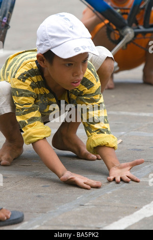 Vietnamese boy in the street Stock Photo - Alamy