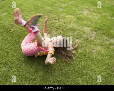 Meadow girls somersault movement series people child 6 years garden ...