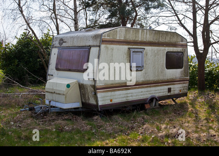 Old, abandoned caravan in a field in Somerset, England Stock Photo ...