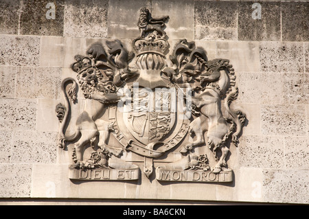 Dieu et mon droit motto on a scroll beneath the shield of Royal coat ...