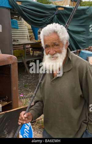 Maori man of New Zealand with beard. In feather cloak Kakahu and woven ...
