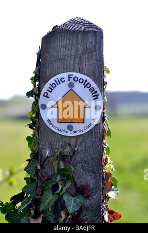 Public Footpath Yellow Arrow Marker Sign on Gatepost Stock Photo - Alamy