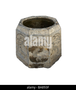 ancient stone bucket finely carved with iced water over black ...