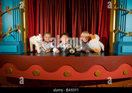 School kids doing puppet show in theatre at library Stock Photo - Alamy