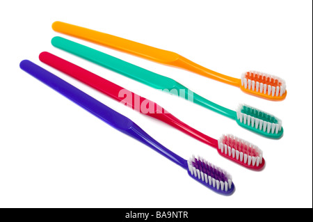 Four coloured toothbrushes Stock Photo - Alamy