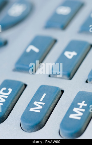 Calculator keypad with focus on the memory minus button Stock Photo - Alamy