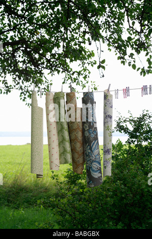Clothes on clothes line Sweden Stock Photo - Alamy