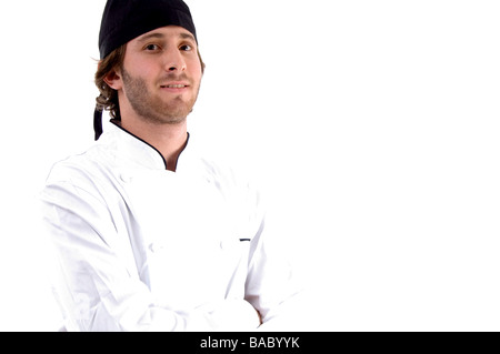 Concept of cooking, young man chef on light background Stock Photo - Alamy