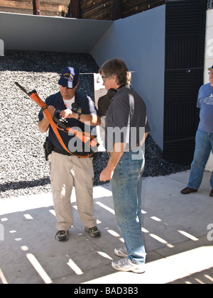 police officer with shotgun Stock Photo - Alamy