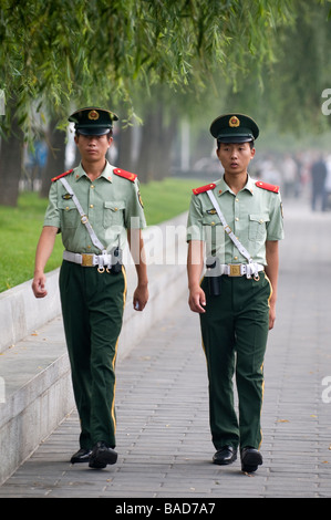 BEIJING, China - Police officers patrol around the Great Hall of the ...