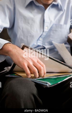 man sorting through mail Stock Photo - Alamy