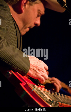 Junior Brown, a popular country music musician, is a guit steel guitar ...