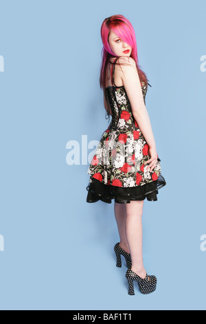 Studio portrait of a standing Goth girl in black Stock Photo - Alamy