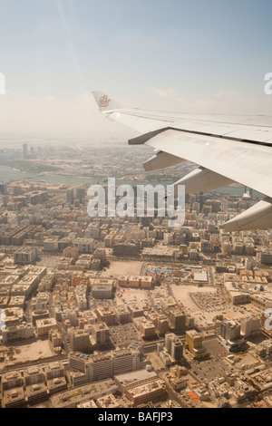 A plane flying over Dubai in the UAE Stock Photo - Alamy
