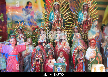 Religious statues and icons at the market near Basilica of Our Lady of ...