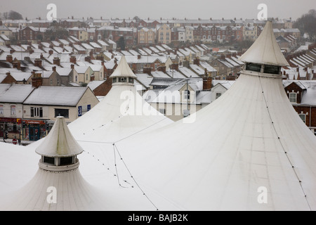 Swindon town centre in the snow, viewed from a side road and at the top ...