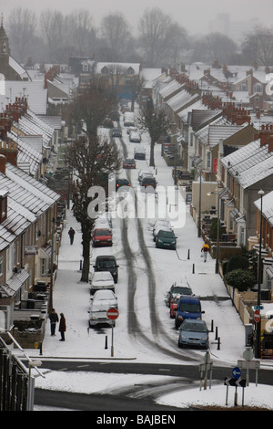 Swindon town centre in the snow, viewed from a side road and at the top ...