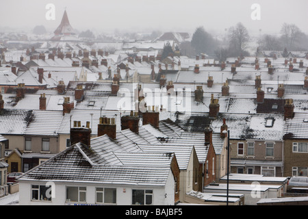 Swindon town centre in the snow, viewed from a side road and at the top ...