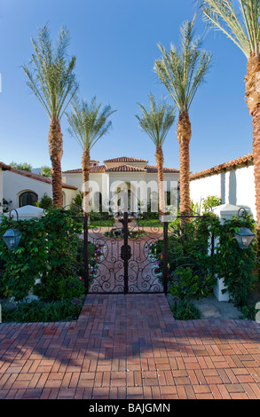 Entrance gate to luxurious house in colonial style Stock Photo - Alamy
