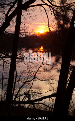 sunrise over a lake Stock Photo - Alamy