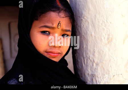Nepal, Terai Region (Madhesh), portrait of young woman from Rana Tharu ...