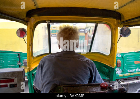 View from inside of a auto rickshaw in India. Also known as tuk tuk ...