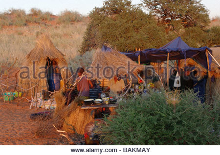 San people, or bushmen cooking food in Botswana, Africa Stock Photo - Alamy