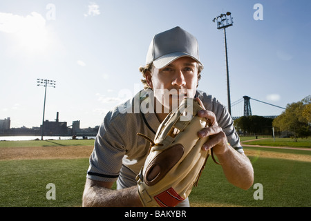Pitcher Baseball Player with a white uniform on baseball Stadium Stock ...