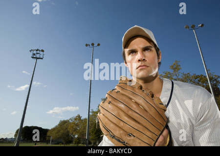 Pitcher Baseball Player with a white uniform on baseball Stadium Stock ...