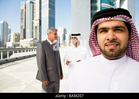 Dubai, United Arab Emirates, Men in national costume in portrait Stock ...