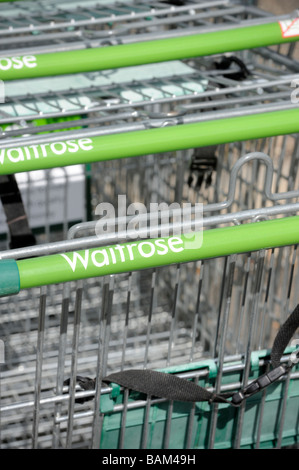 Shopping trolleys parked in a trolley park at a supermarket Stock Photo ...