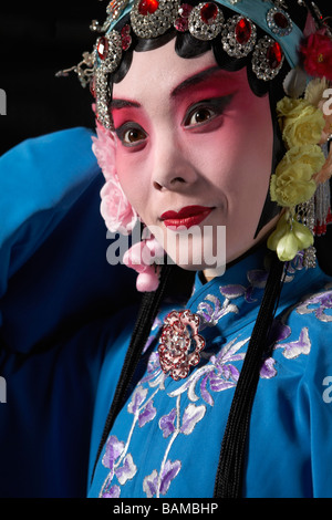 Beautiful Chinese woman wearing a traditional dress known as a ...