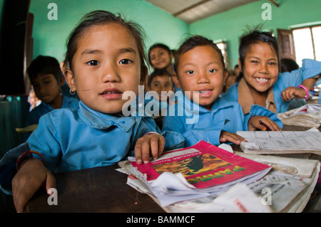 A NEPALI SCHOOL GIRL in uniform in the classroom - KATHAMANDU VALLEY ...