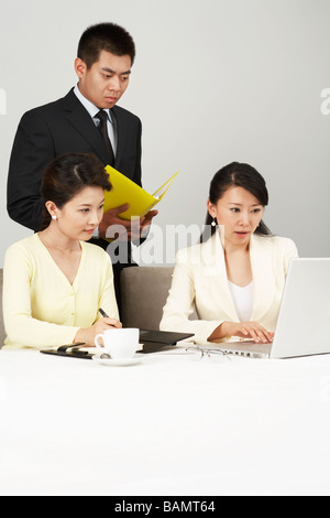 serious man with colleague during lunch break Stock Photo - Alamy