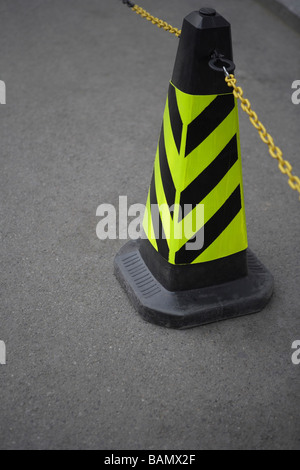 Close up of one traffic cone on a road with path Stock Photo - Alamy