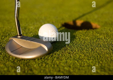 The gimme putt - golf concepts Stock Photo - Alamy