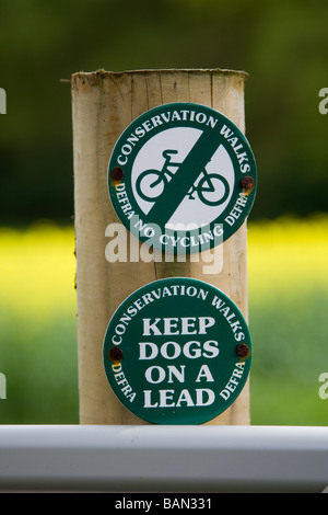 No cycling and keep dogs on a lead sign in a public park Stock Photo ...