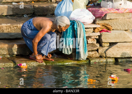Indians doing the traditional morning ablution Varanasi Benares Uttar ...